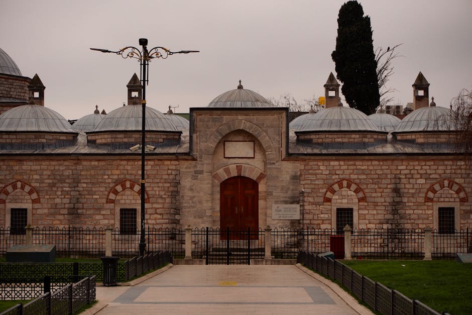 Traditional Ottoman bathhouse in Istanbul with classic domes and stone facade