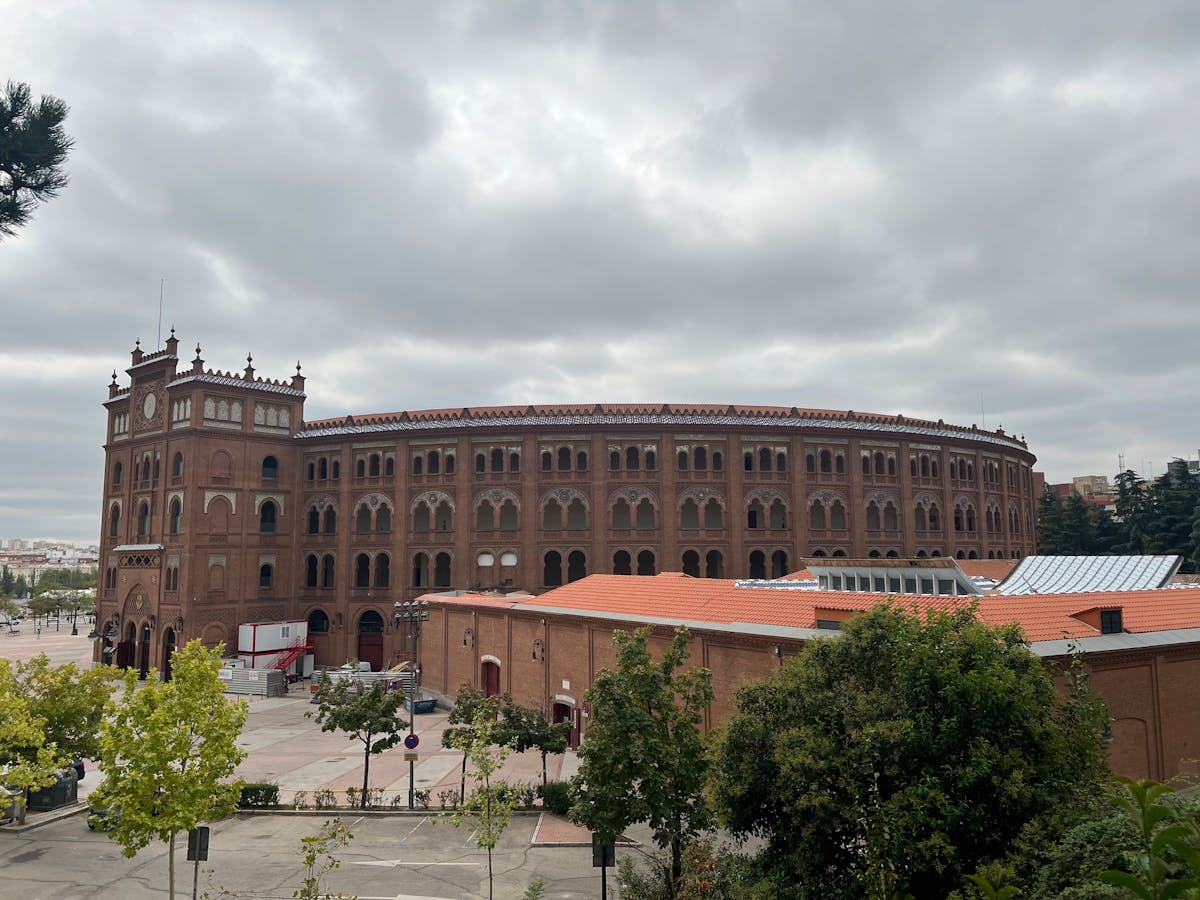 Plaza de Toros de Las Ventas Madrid under a cloudy sky