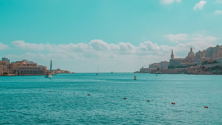 Tranquil seascape showcasing Malta's stunning historic harbor with blue waters