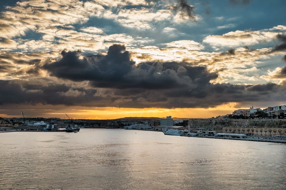 Breathtaking sunset view over Valletta harbor in Malta with vibrant clouds