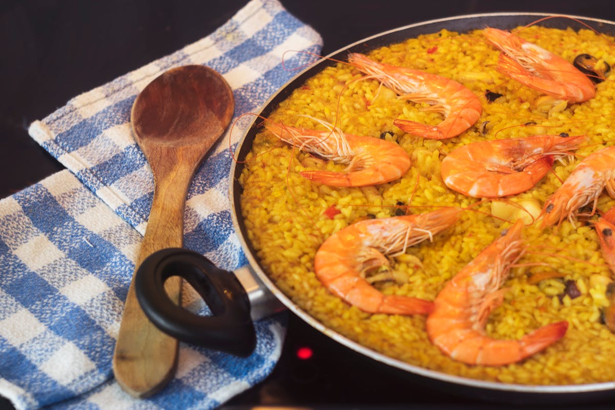 Delicious homemade seafood paella in pan