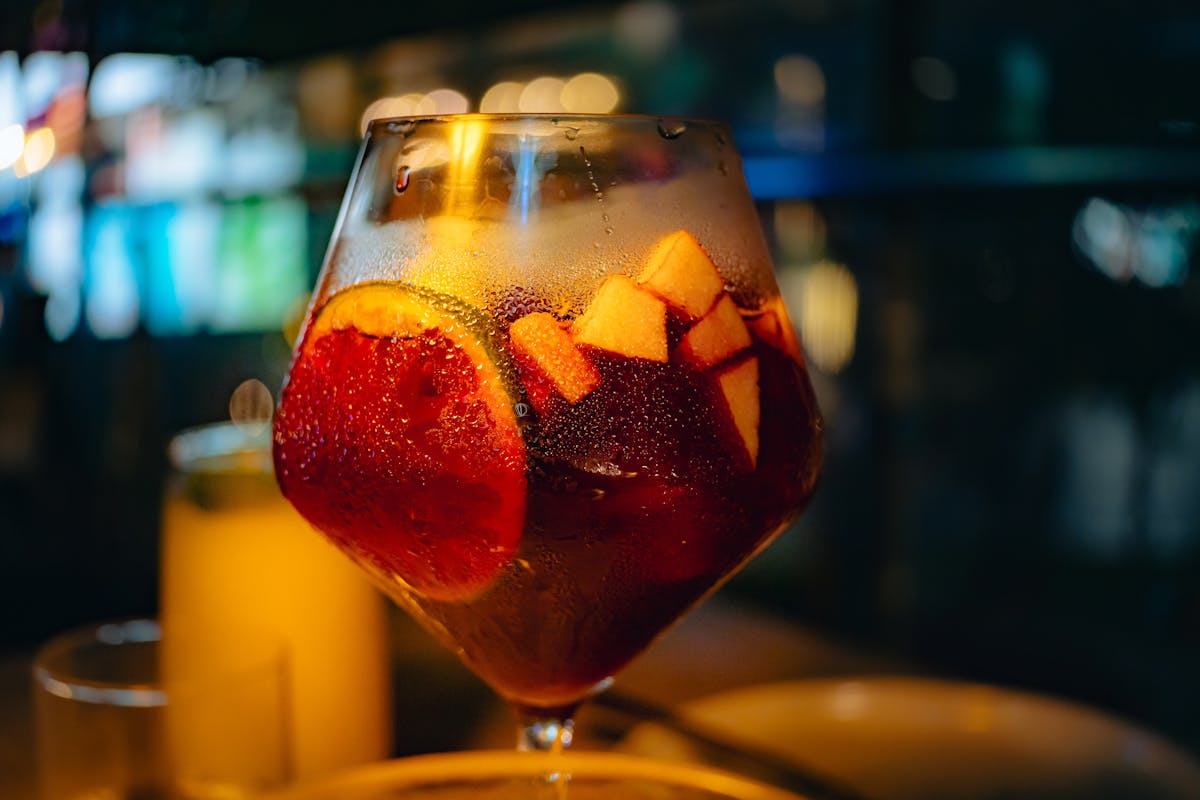 Refreshing sangria with fresh fruits in glass
