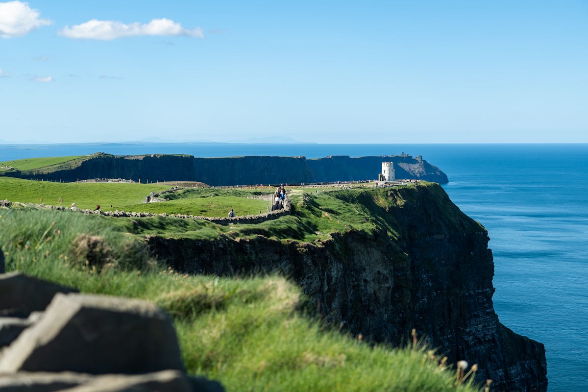 Scenic view of the Cliffs of Moher and Atlantic Ocean on a clear sunny day