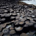 Interlocking basalt columns of the Giant Causeway by the rugged Northern Ireland coast