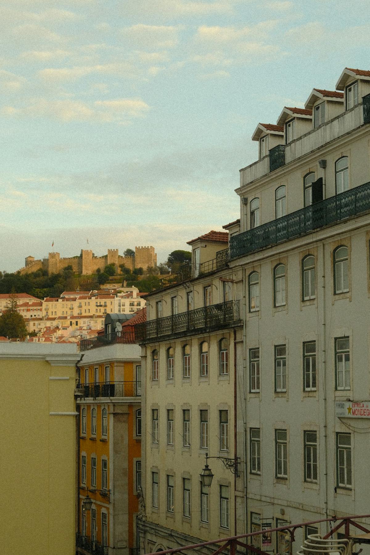 Traditional terracotta rooftops of Lisbon seen from elevated viewpoint