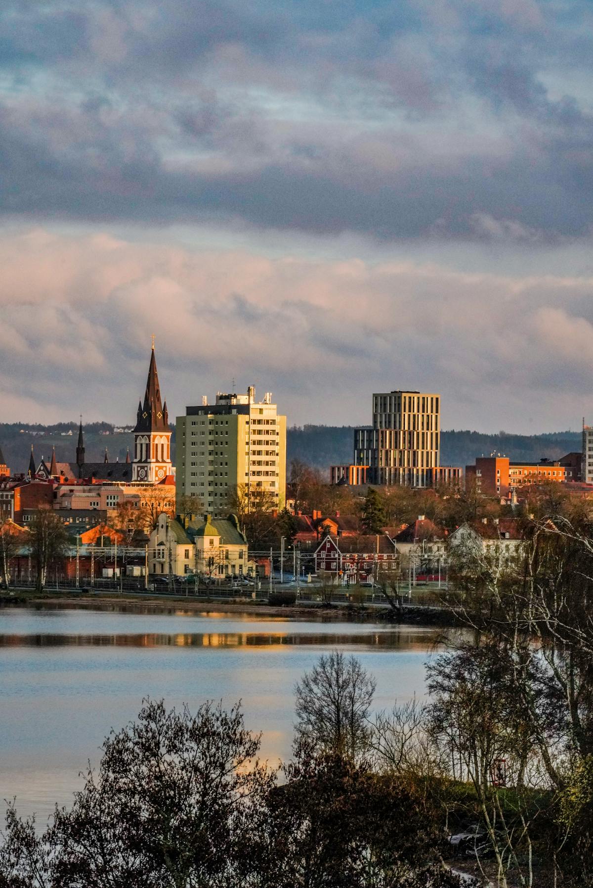 View over Lisbon rooftops with the Tagus river and distant hills