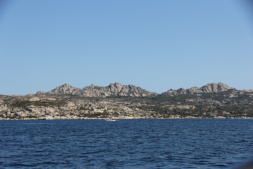 Rocky coastline and blue water at Caprera island in the La Maddalena Archipelago