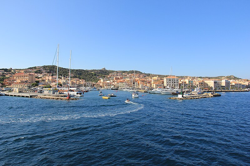 Port of La Maddalena with boats and colorful buildings