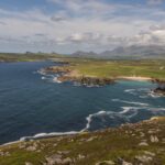 Breathtaking Dingle Peninsula coast with green landscapes and rugged cliffs