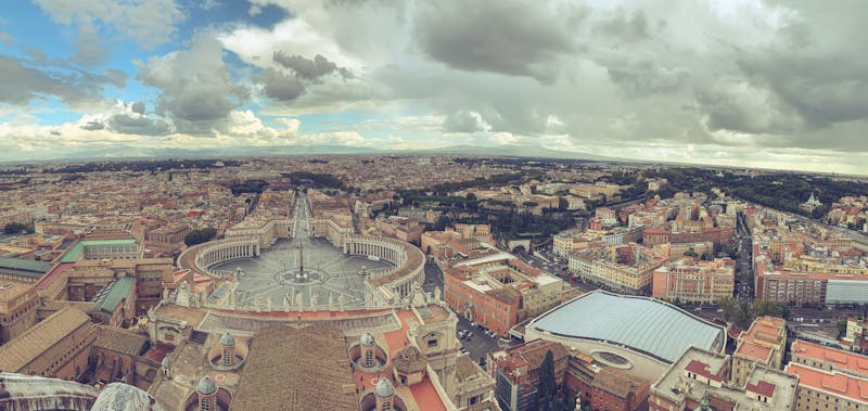 Aerial view of St Peters Square with its iconic colonnades in Vatican City