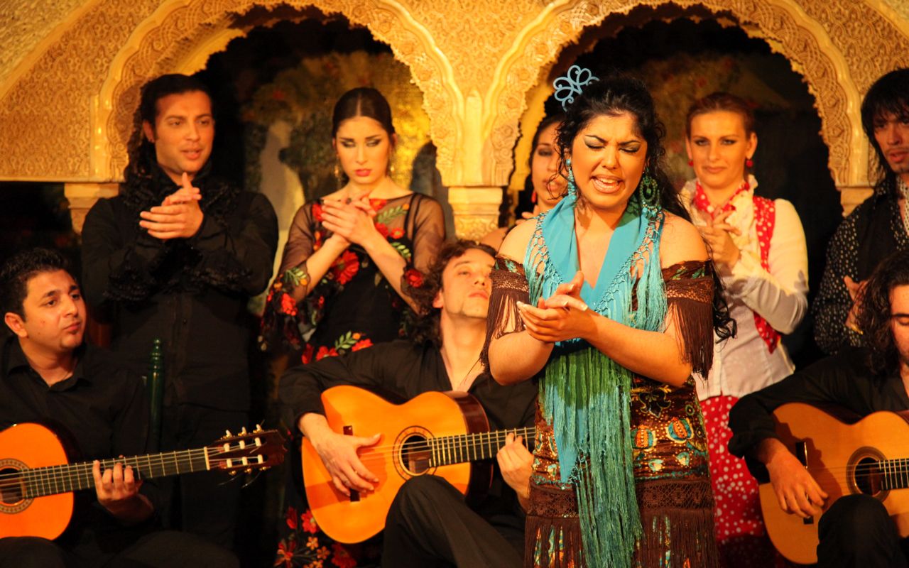 Performers on stage at Tablao Flamenco Cordobes in Barcelona during a live flamenco show