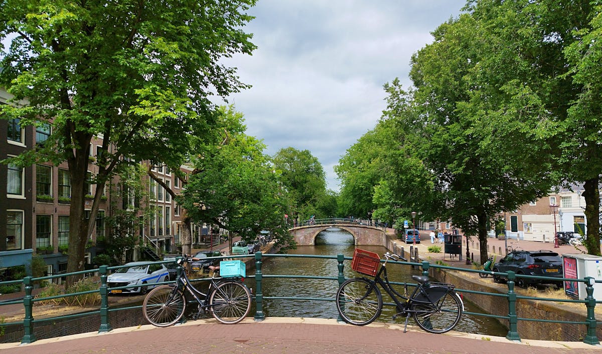 Scenic view of bicycles on a bridge overlooking an Amsterdam canal