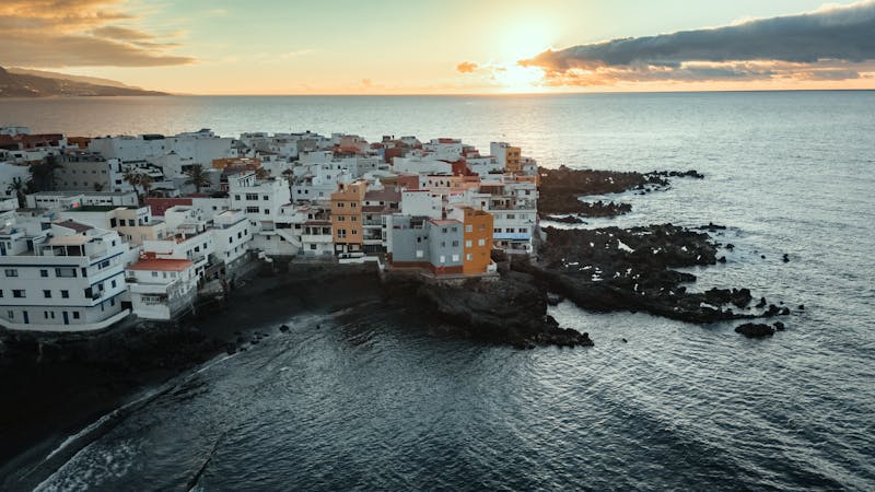 Coastal town of Puerto de la Cruz in Tenerife captured at sunset with ocean views