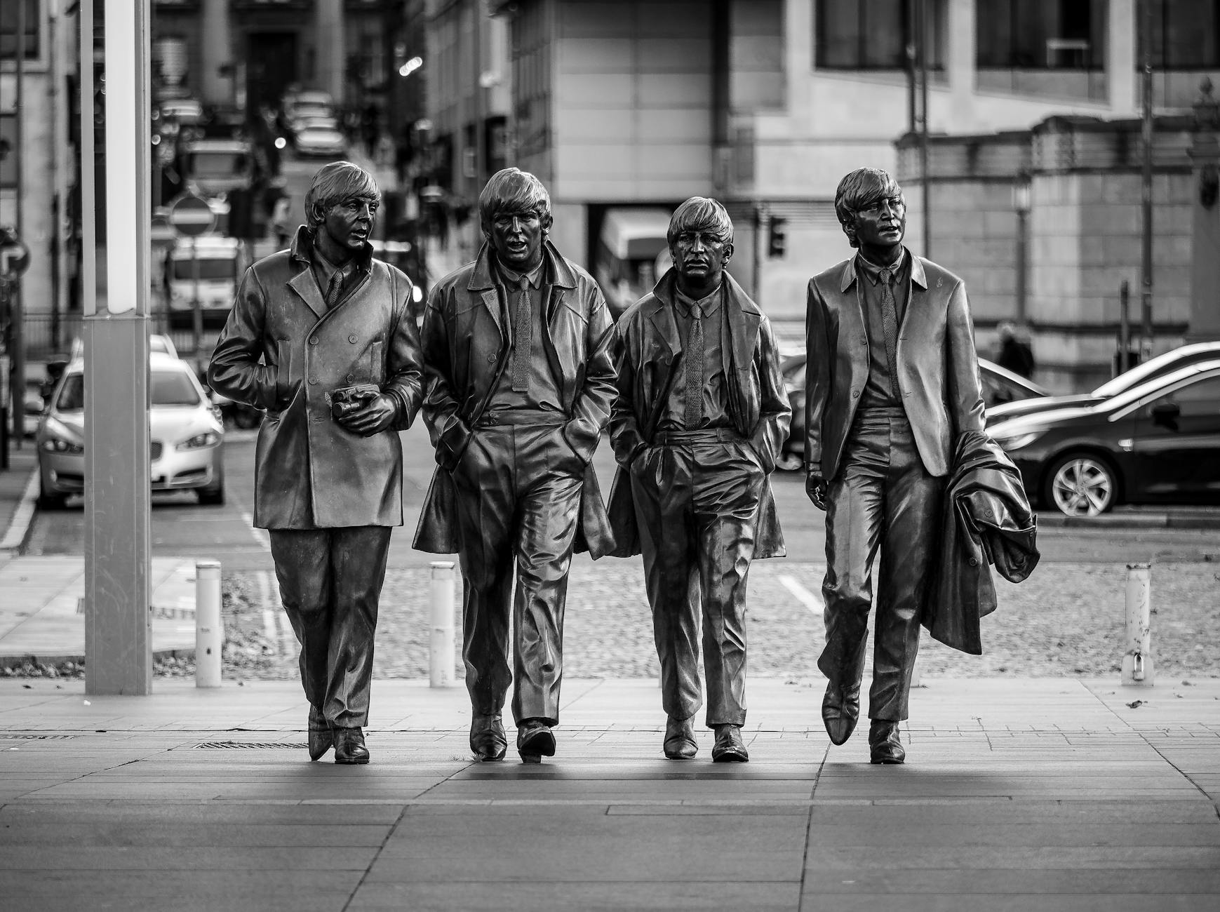 Black and white view of the Beatles statues in Liverpool