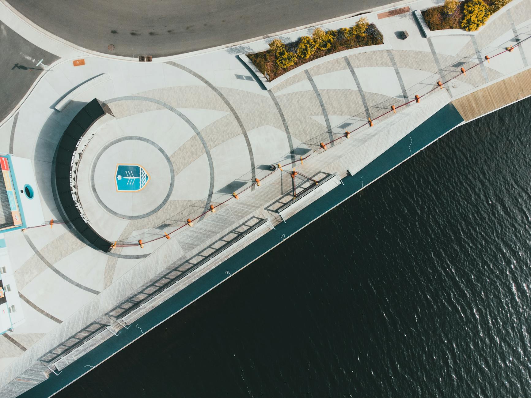 Drone shot of a modern waterfront with geometric patterns