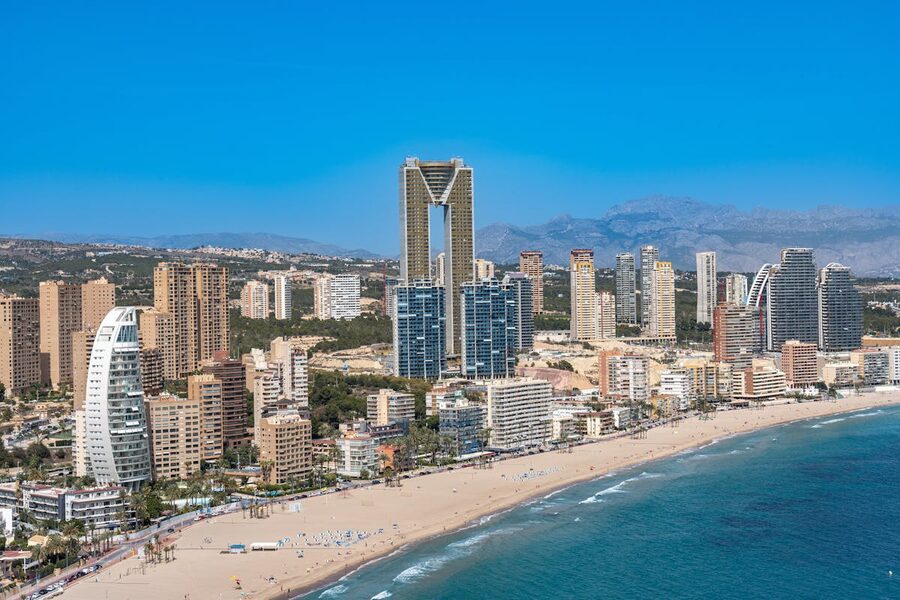 Aerial view of Benidorm beachfront with iconic skyscrapers and Mediterranean coast