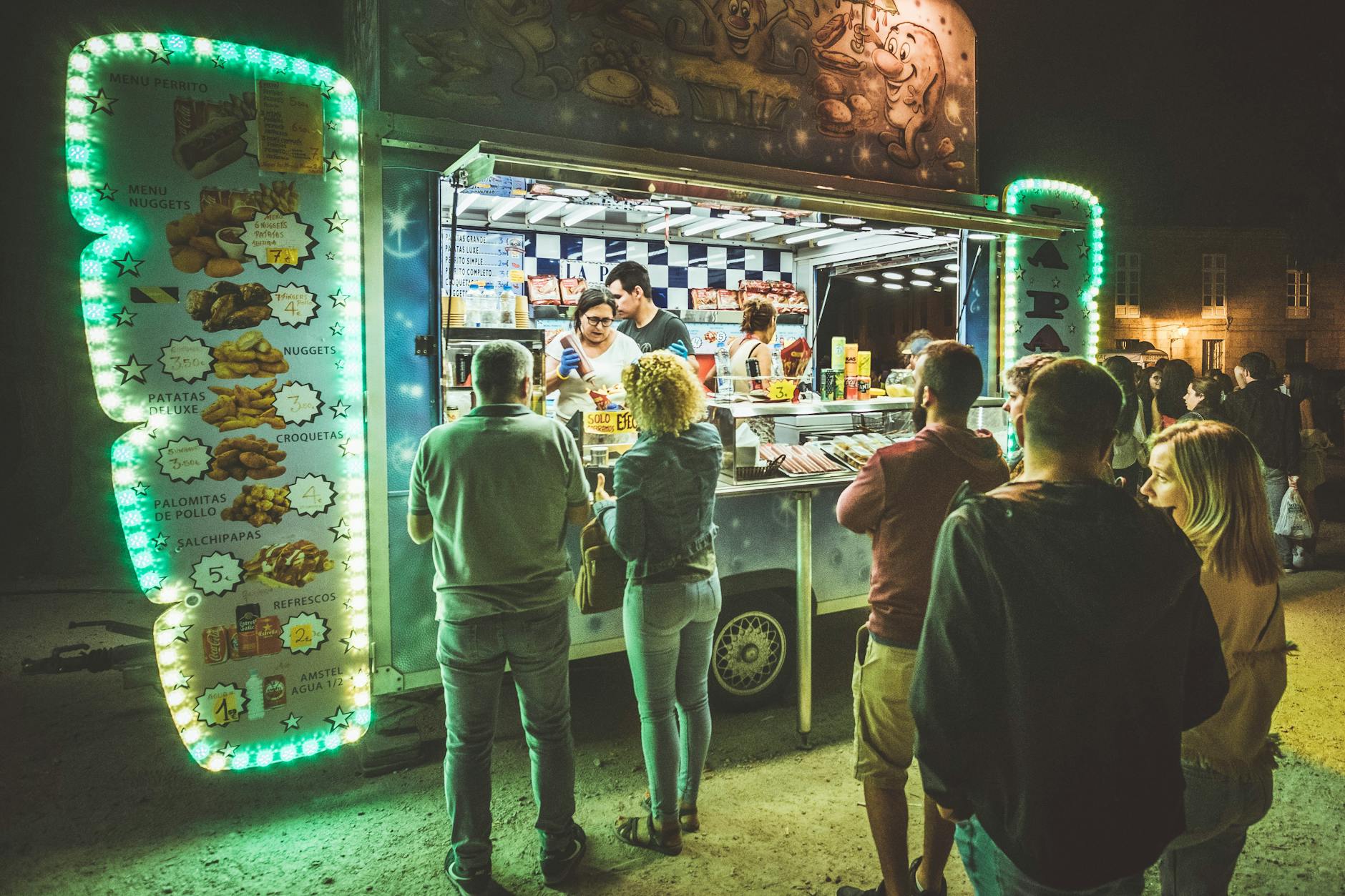 Crowded pintxos bars spilling into the streets of Bilbao on a warm evening