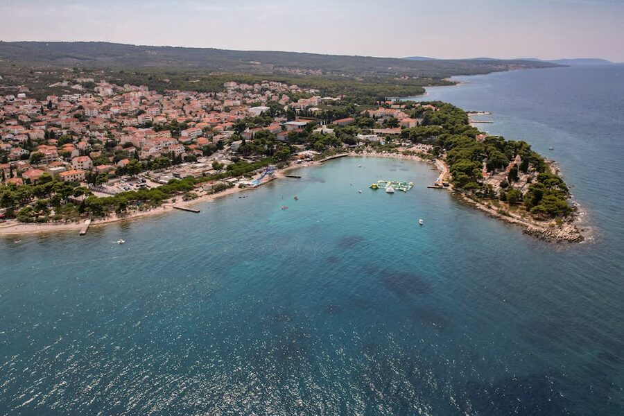 Aerial capture of a coastal town and harbor on the Adriatic