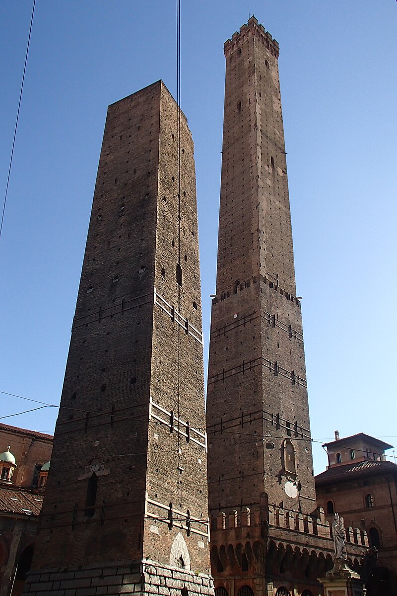 The Two Towers Asinelli and Garisenda in Bologna Italy against a blue sky