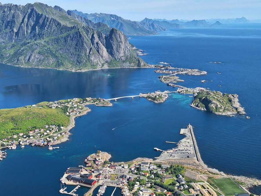 Stunning aerial shot of a coastal town and fjord in the Lofoten Islands, Norway.