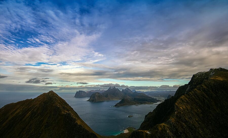 Breathtaking aerial view of Lofoten Islands in Norway, capturing picturesque mountains and serene se