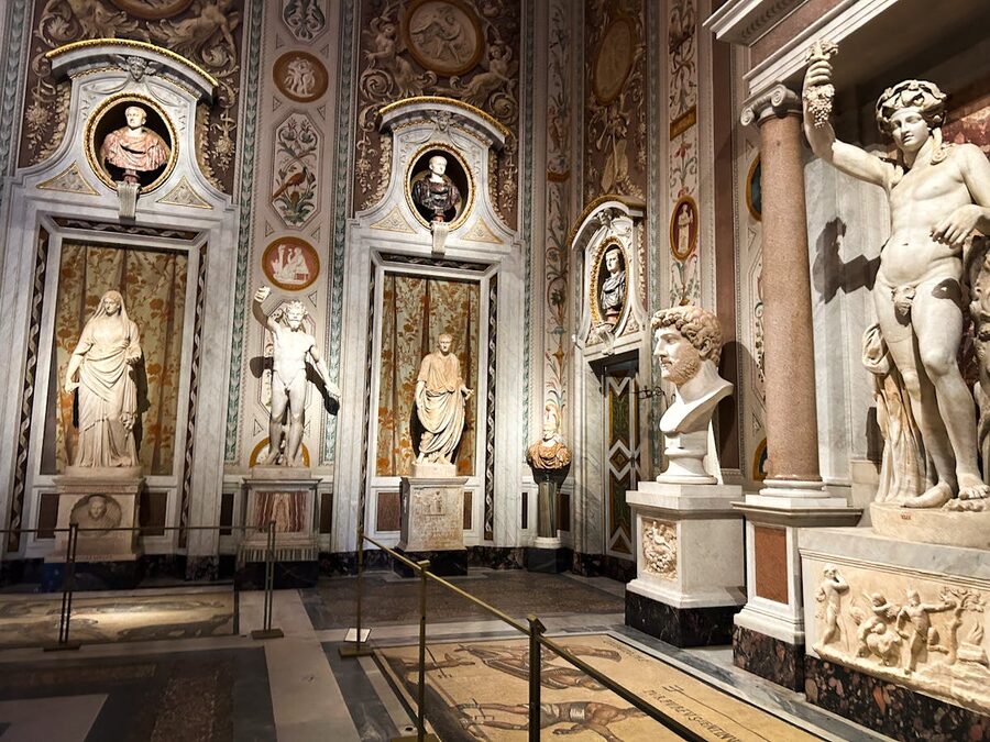 Ancient Roman sculptures and decorative elements inside the Borghese Gallery Rome
