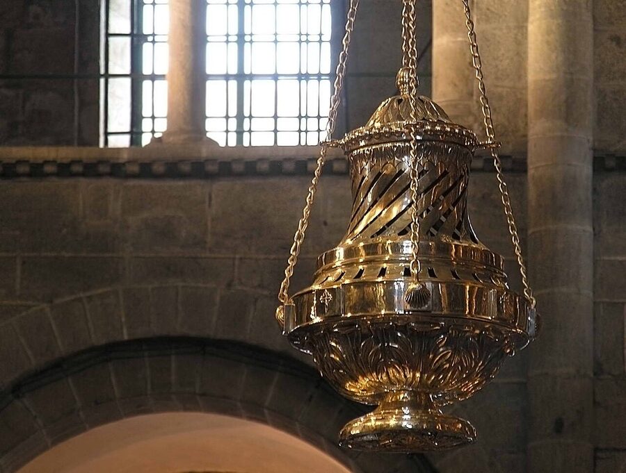 The Botafumeiro giant incense burner swinging inside Santiago de Compostela Cathedral