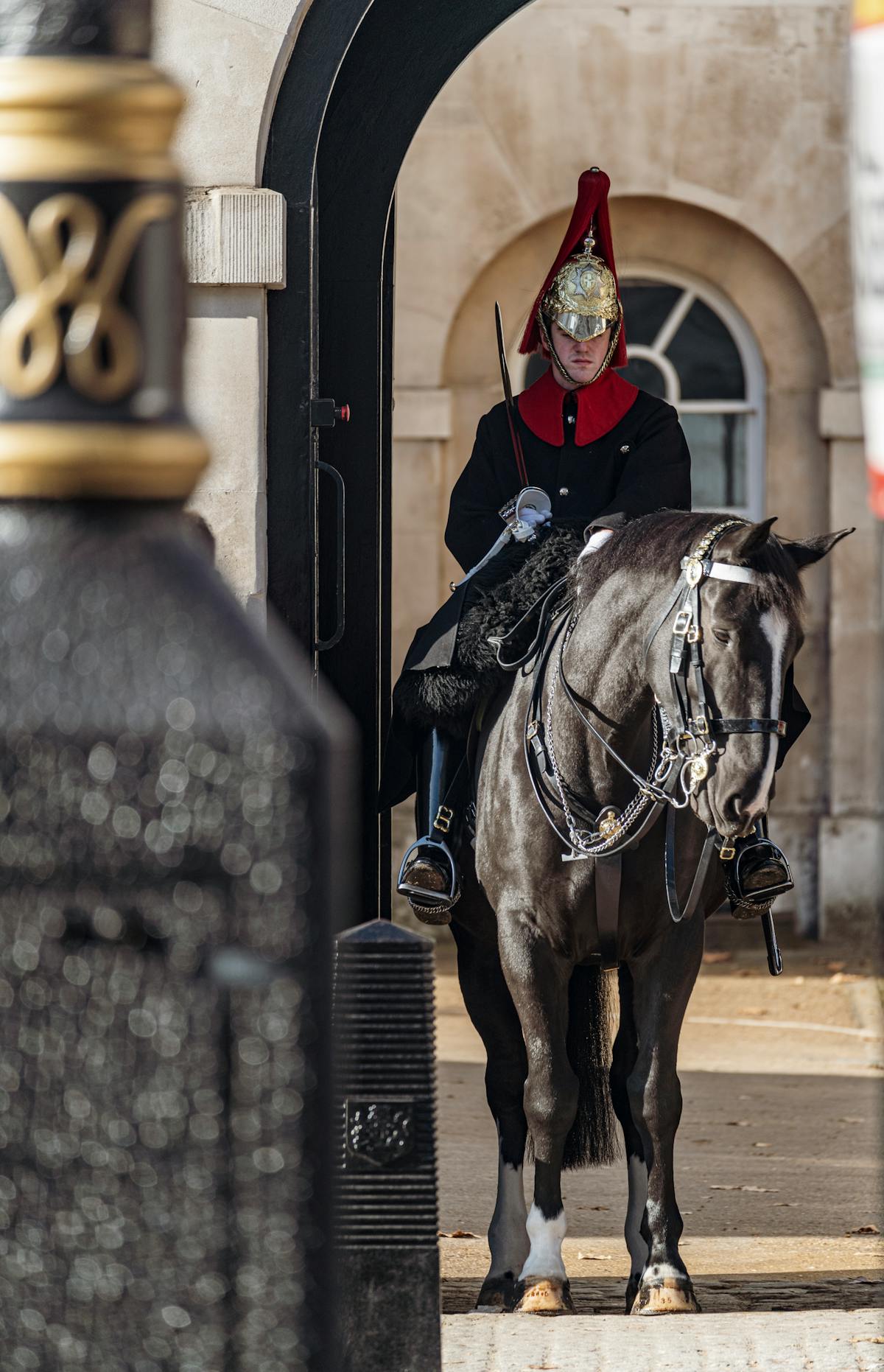 Royal Guard on horseback in traditional uniform at the London Household Cavalry post