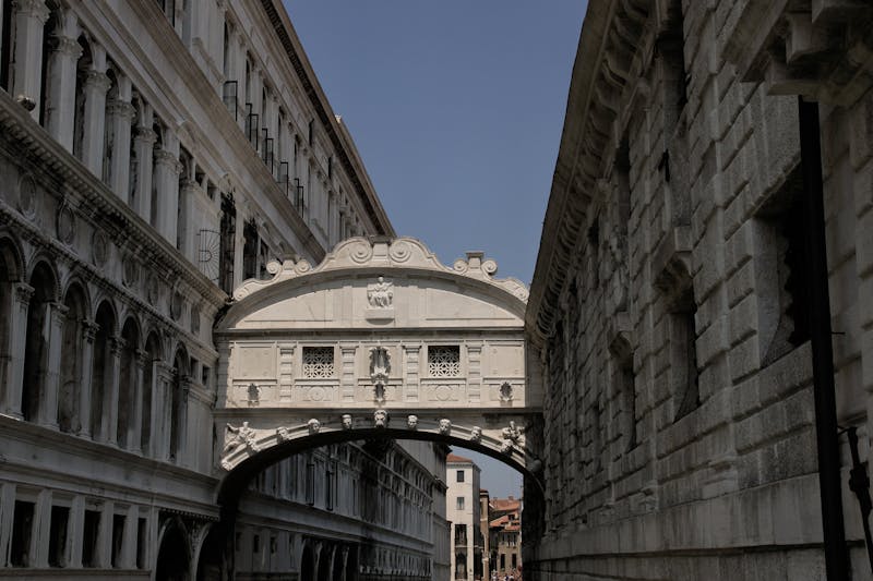 The iconic Bridge of Sighs in Venice connecting two historic buildings over a narrow canal