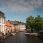Canal in Bruges Belgium with medieval buildings and reflections