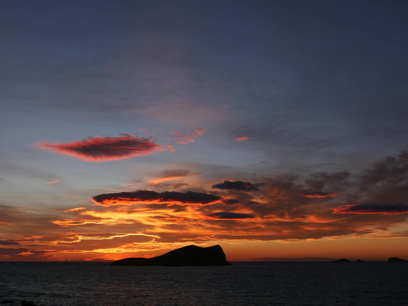 Dramatic sunset with clouds over Cala Comte, Ibiza