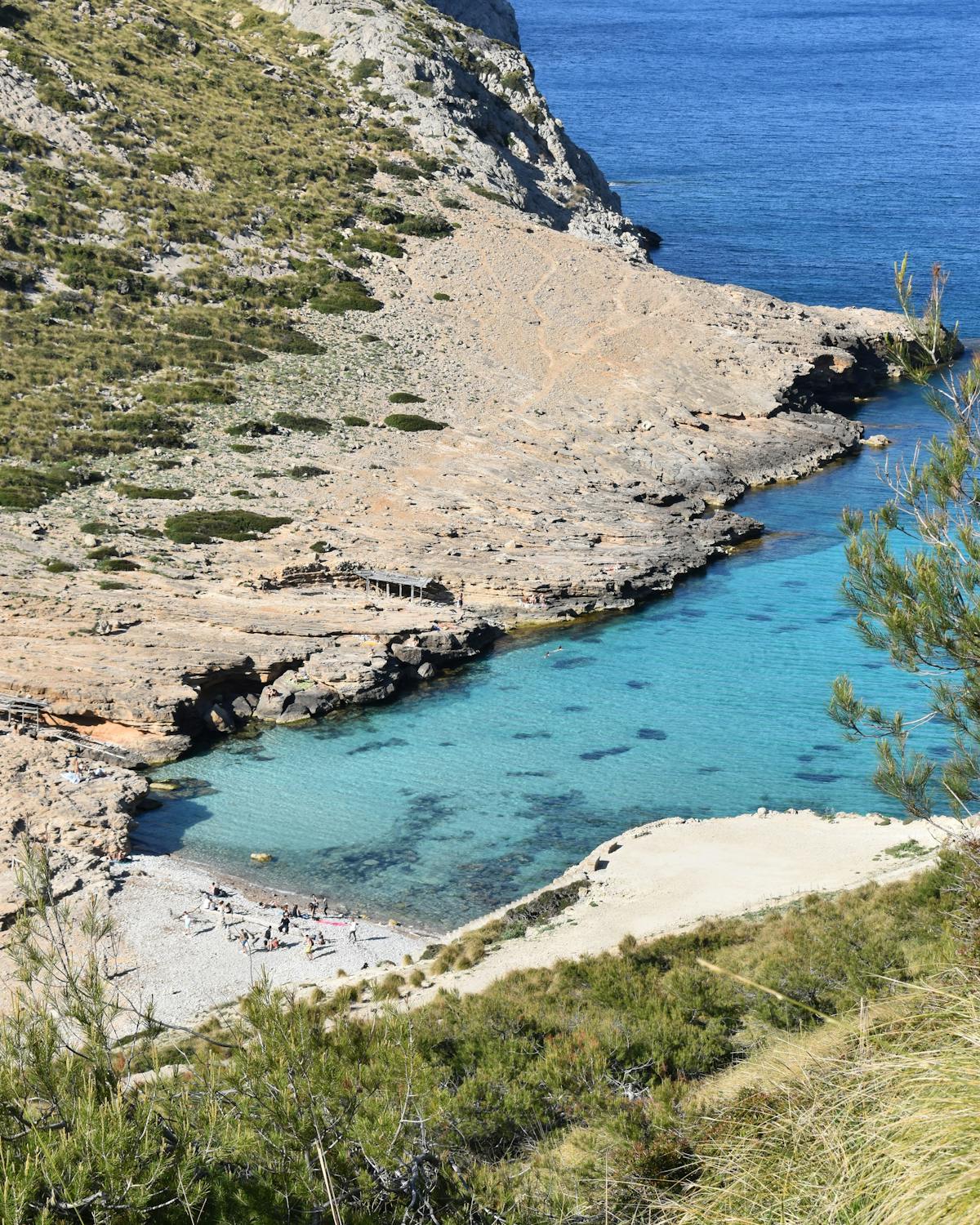 Aerial view of turquoise waters and rocky coast in Mallorca