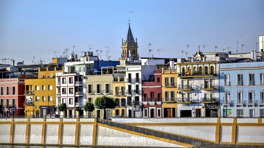 Colorful building facades on Calle Betis in the Triana neighbourhood of Seville