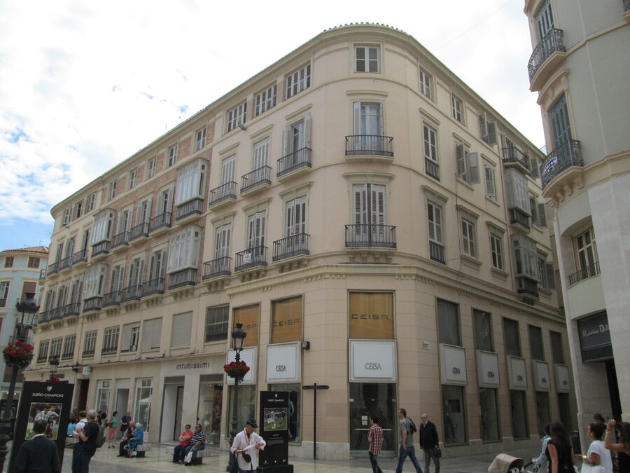 Historic building facade on Calle Larios, the main shopping street in Malaga