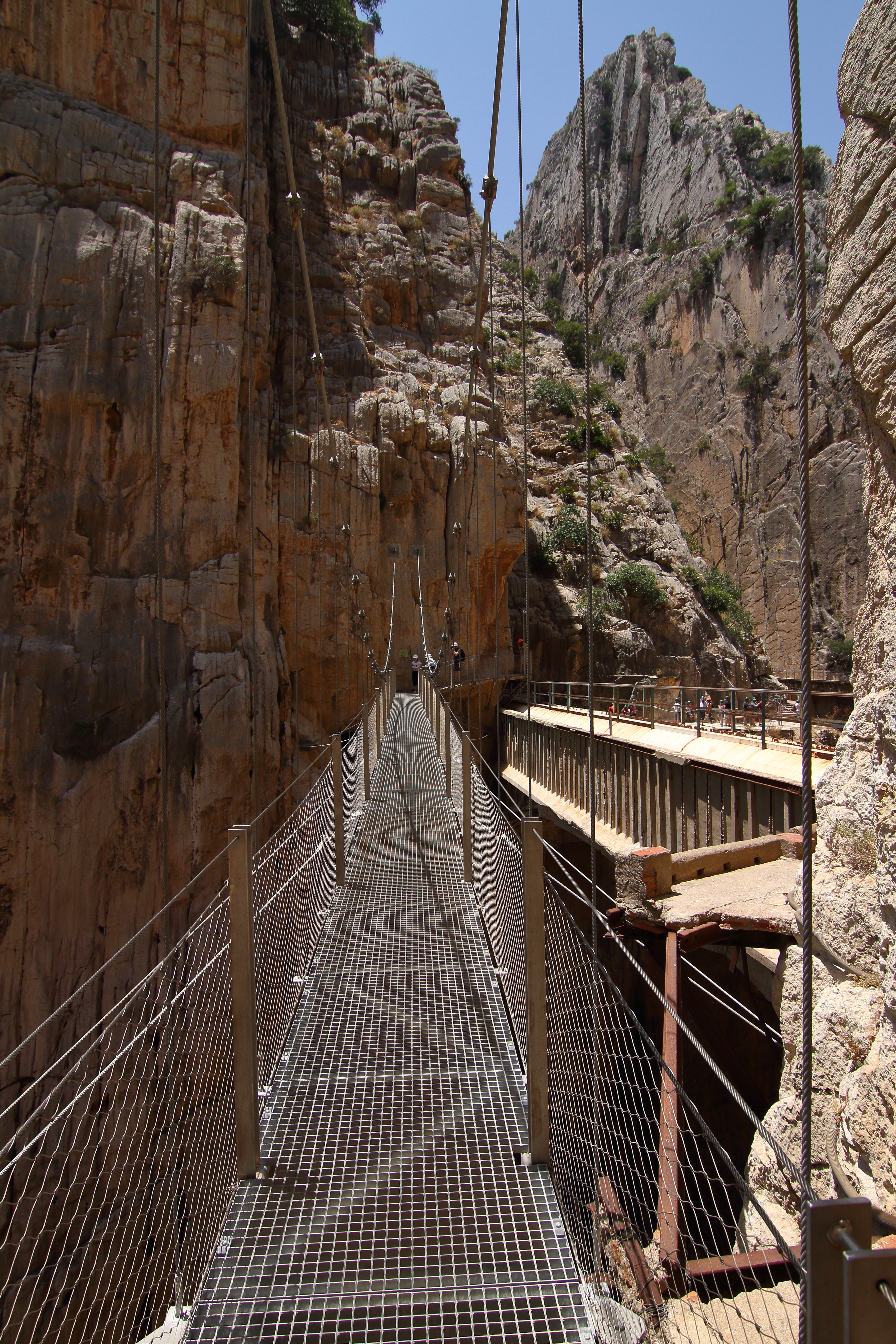 The hanging bridge at Caminito del Rey spanning the deep gorge
