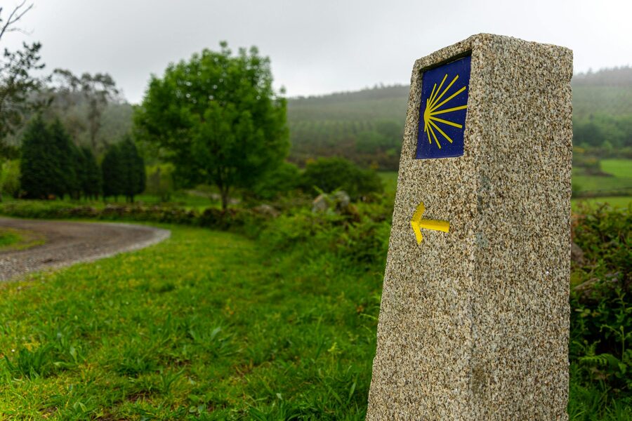 Stone waymark with scallop shell on the Camino de Santiago route