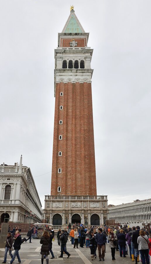 The bell tower of St Marks Basilica with the Sansovino Loggetta at its base in Venice