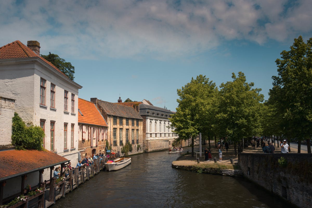 Canal in Bruges Belgium with medieval buildings and reflections