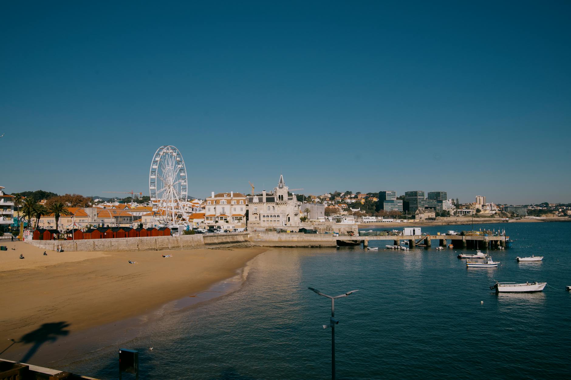 Aerial view of Cascais Portugal showing the beach, Ferris wheel and historic buildings