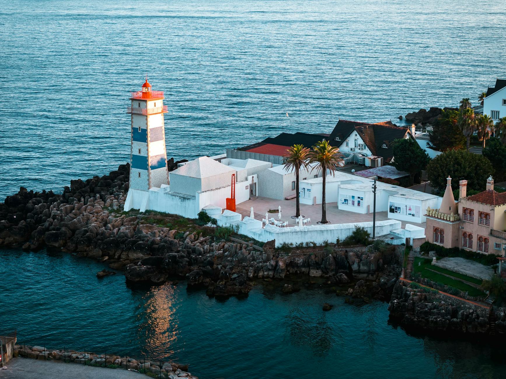 Cascais lighthouse and coastal buildings in Portugal