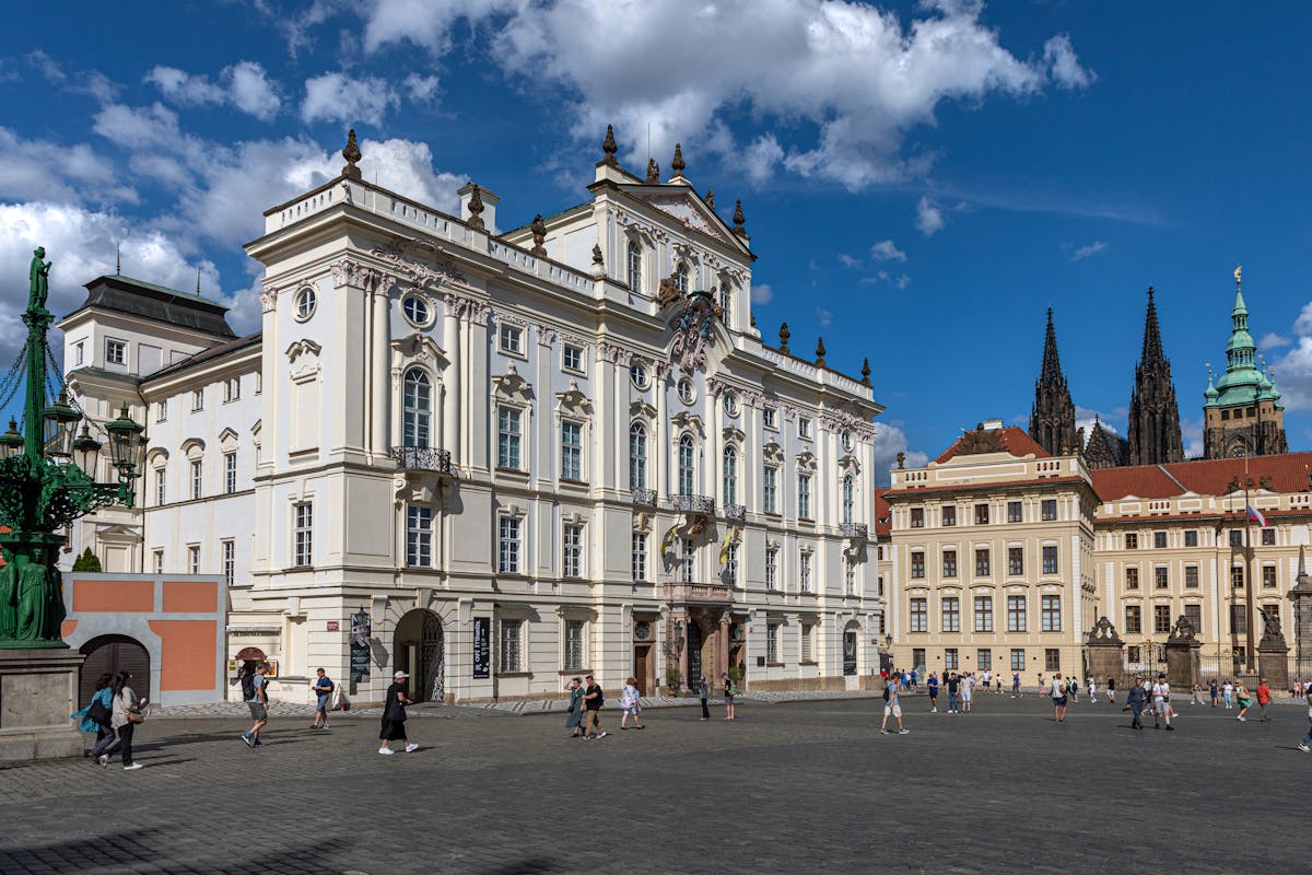 Beautiful daylight view of Prague Castle and surrounding historic red-roofed buildings