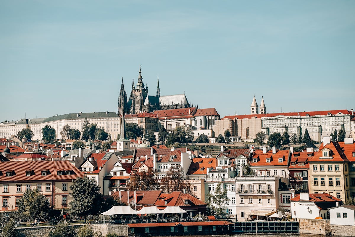 Charming view of Prague Castle and red-roofed historic buildings