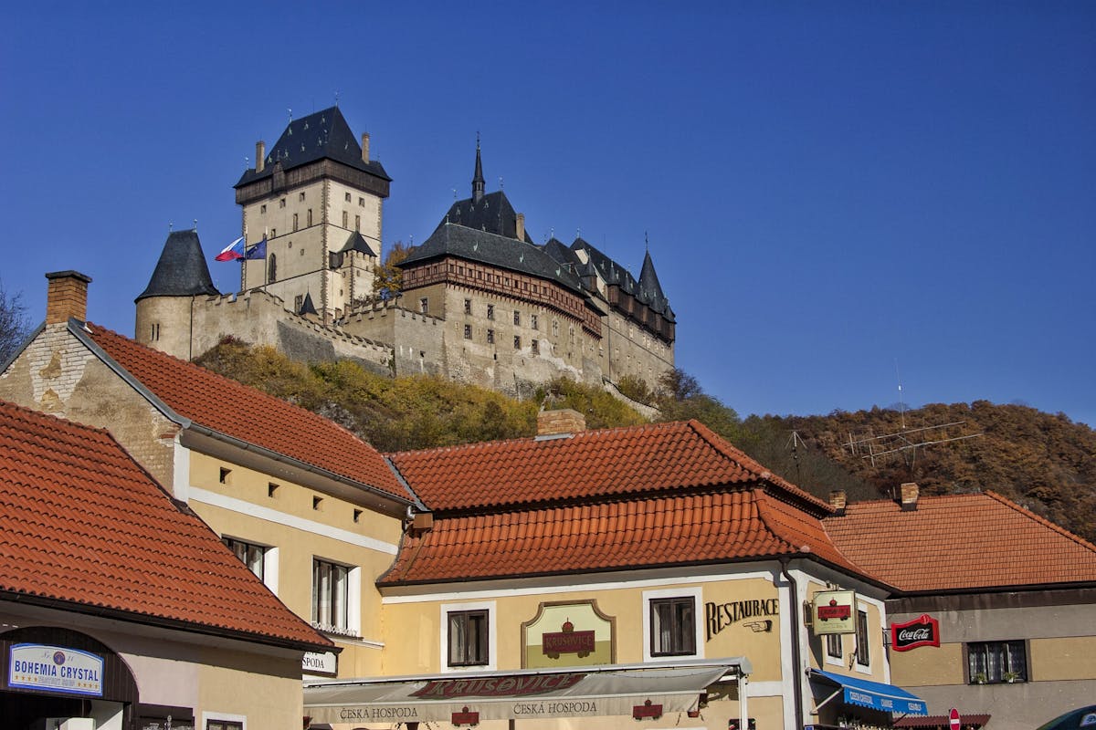 Scenic view of Karlstejn Castle towering above the village in Czechia