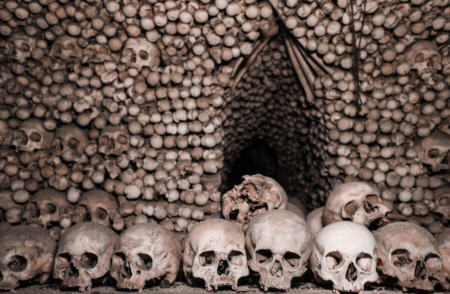 Skulls arranged in an underground ossuary catacomb