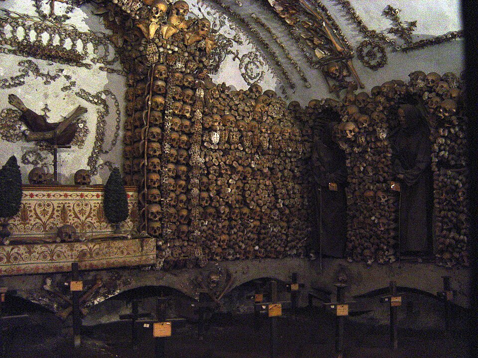 Interior of the Capuchin Crypt in Rome showing walls and ceiling decorated with human bones