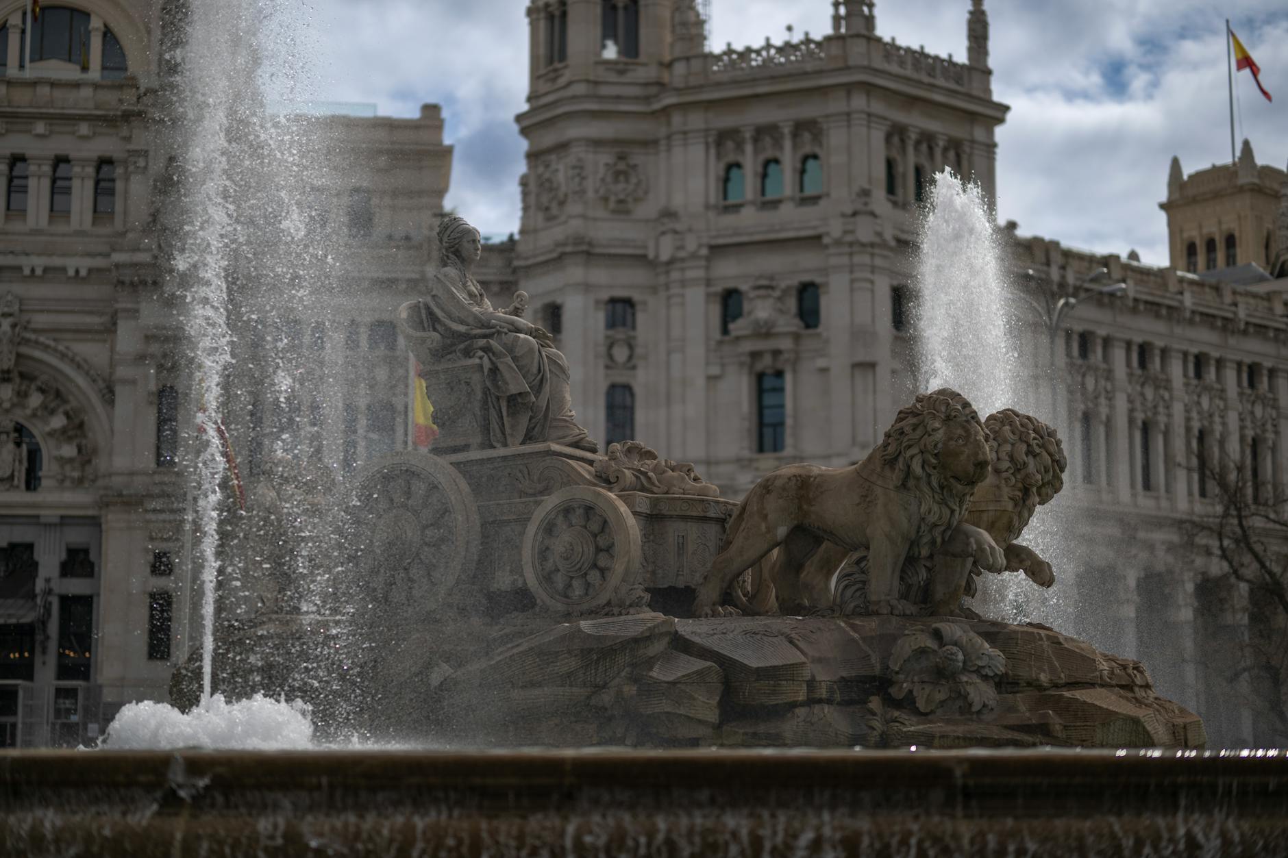 The iconic Cibeles Fountain in Madrid surrounded by historic buildings