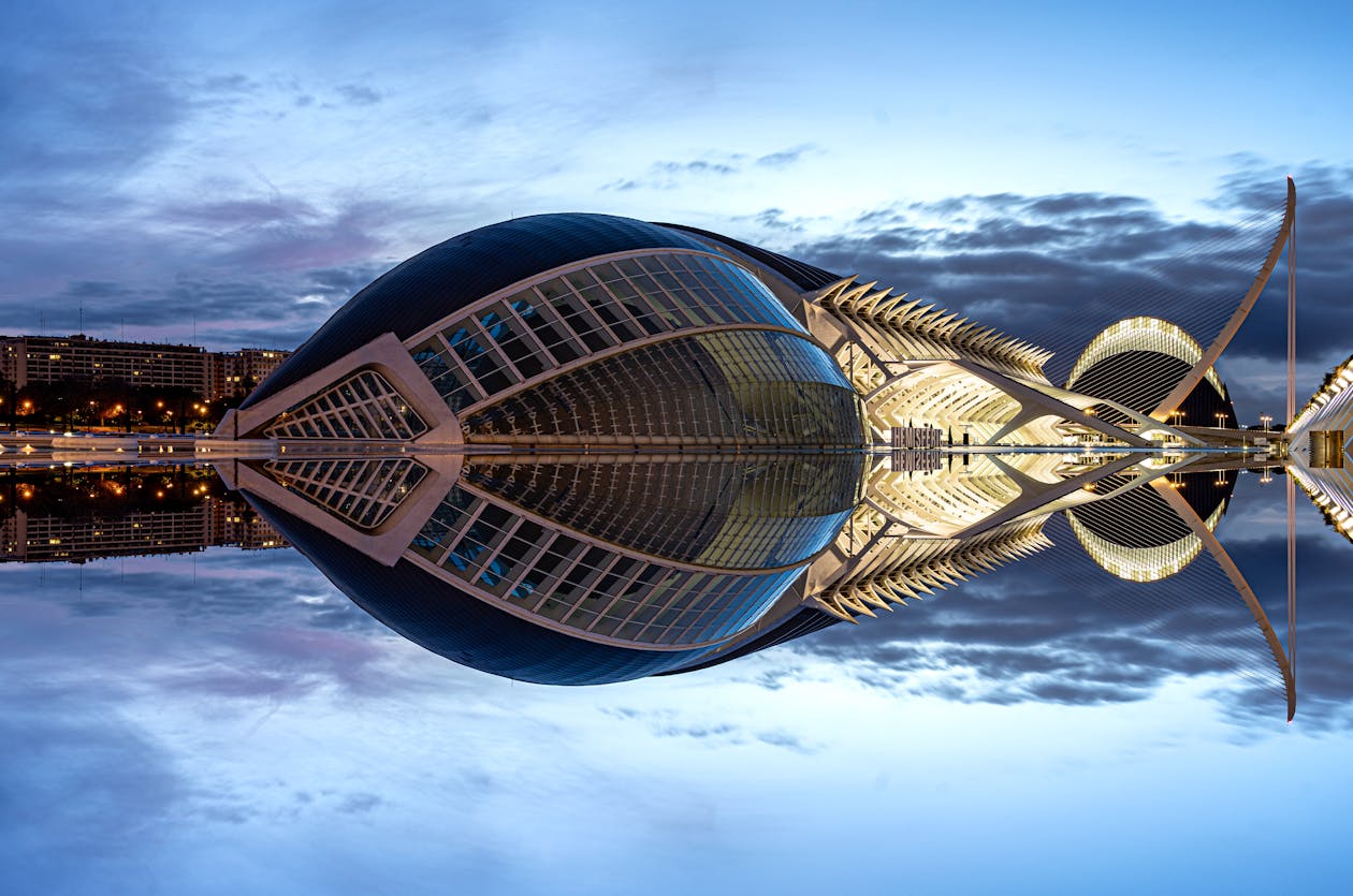 City of Arts and Sciences complex in Valencia at twilight with dramatic sky reflections