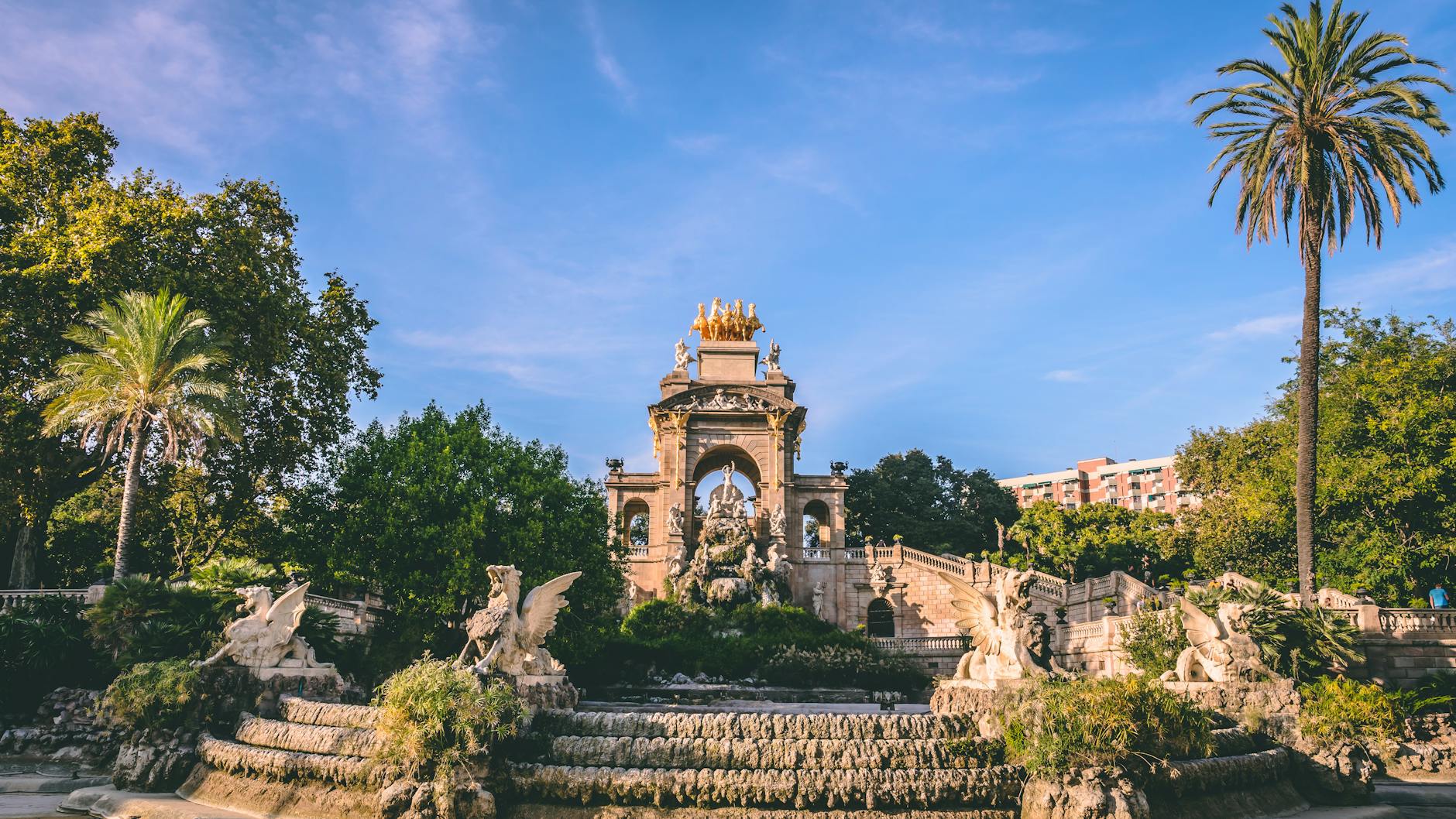 Cascada Monument fountain in Ciutadella Park Barcelona under blue sky