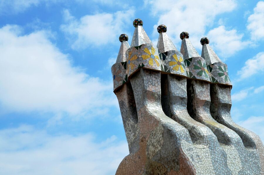 Blue-tiled interior lightwell of Casa Batllo showing Gaudi's innovative ventilation design