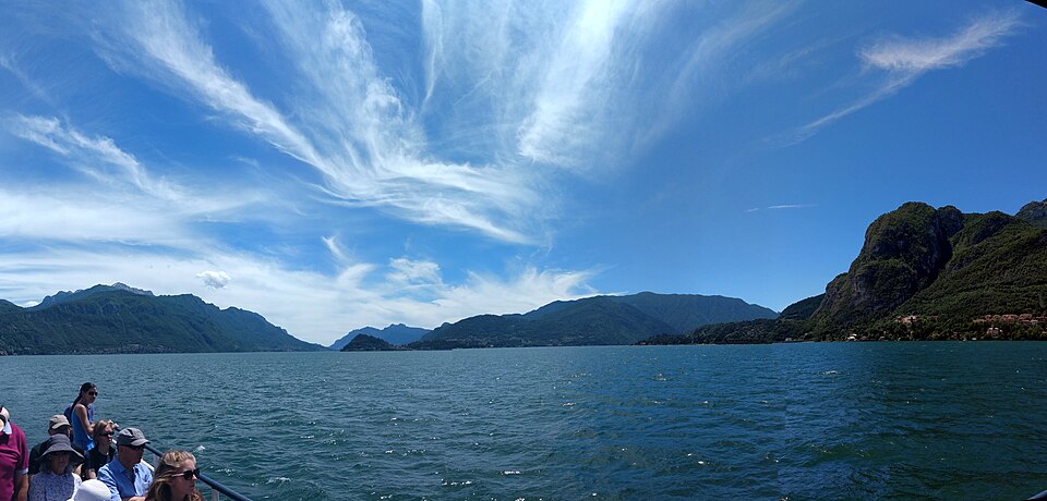 Panoramic aerial view of Lake Como showing the surrounding mountains and shoreline towns